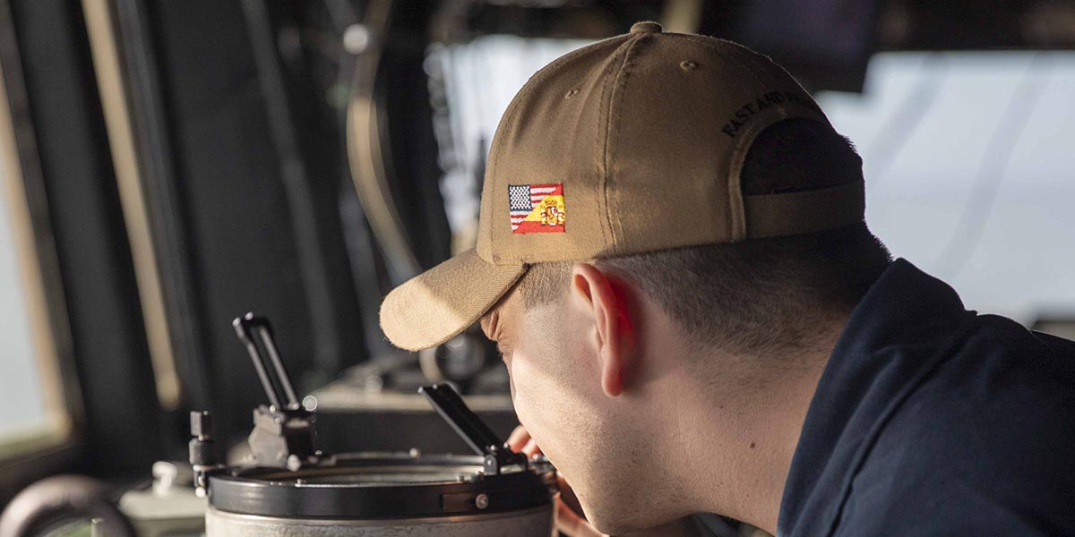The beautiful caps with Spanish flags of the American destroyer USS ...